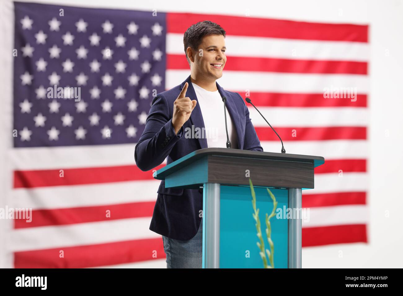 Person gesturing behind microphone hi-res stock photography and images ...