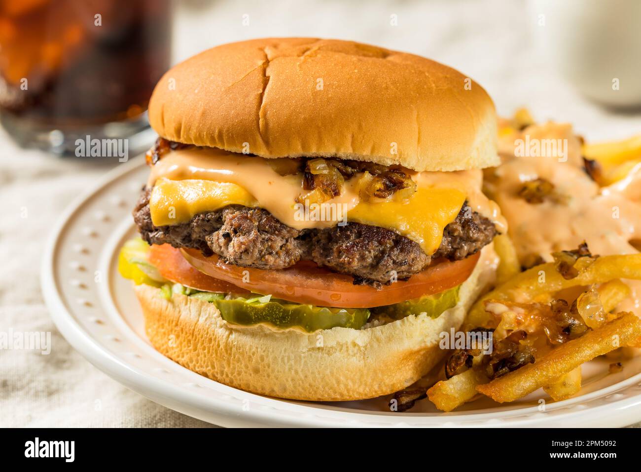 Fast Food Animal Cheeseburger with Burger Sauce and Pickles Stock Photo ...