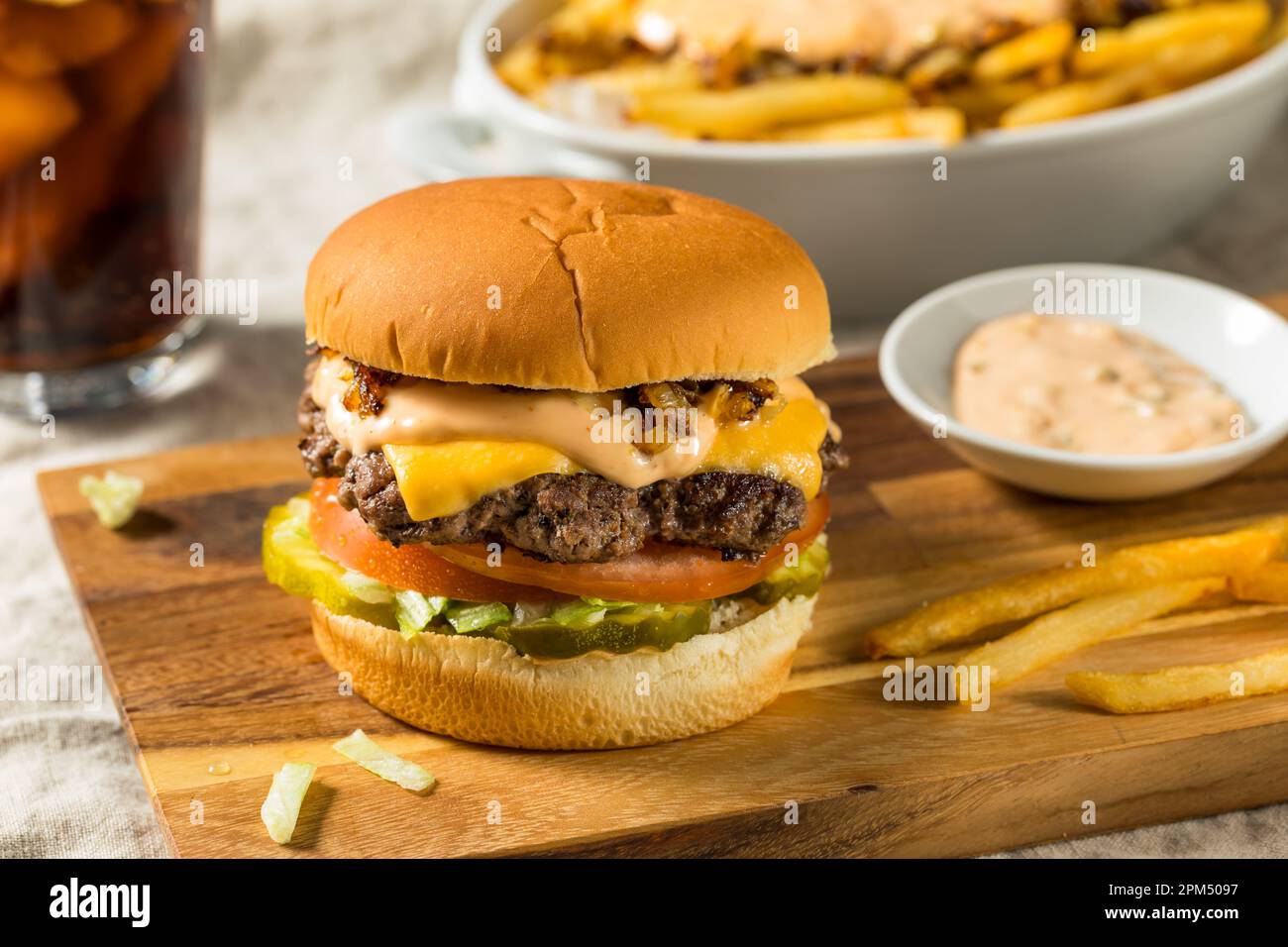 Fast Food Animal Cheeseburger with Burger Sauce and Pickles Stock Photo ...