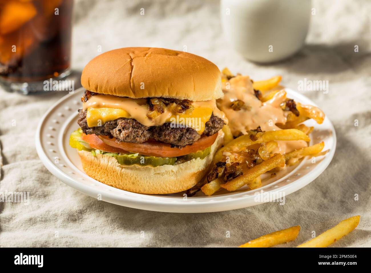 Fast Food Animal Cheeseburger with Burger Sauce and Pickles Stock Photo ...