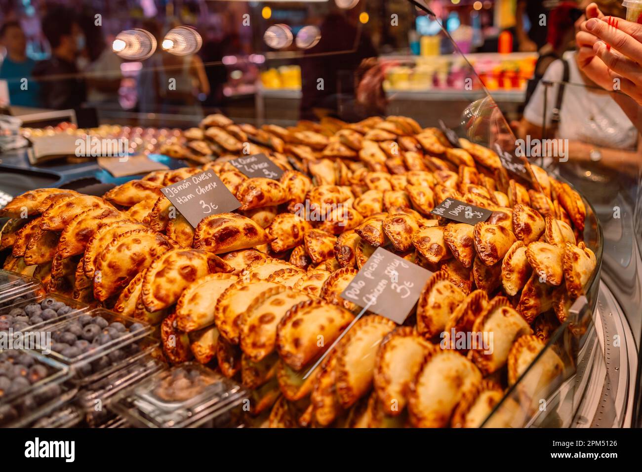 Pastry products on the market stall. Different semi healthy pastries ...