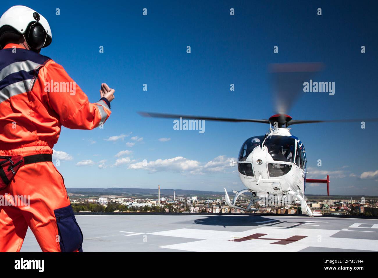 Modern medical helicopter on a hospital rooftop helipad Stock Photo - Alamy