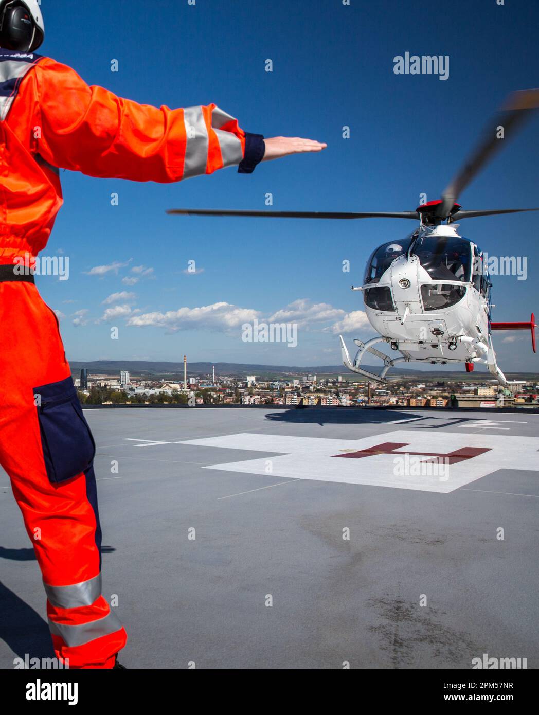 Modern medical helicopter on a hospital rooftop helipad Stock Photo - Alamy