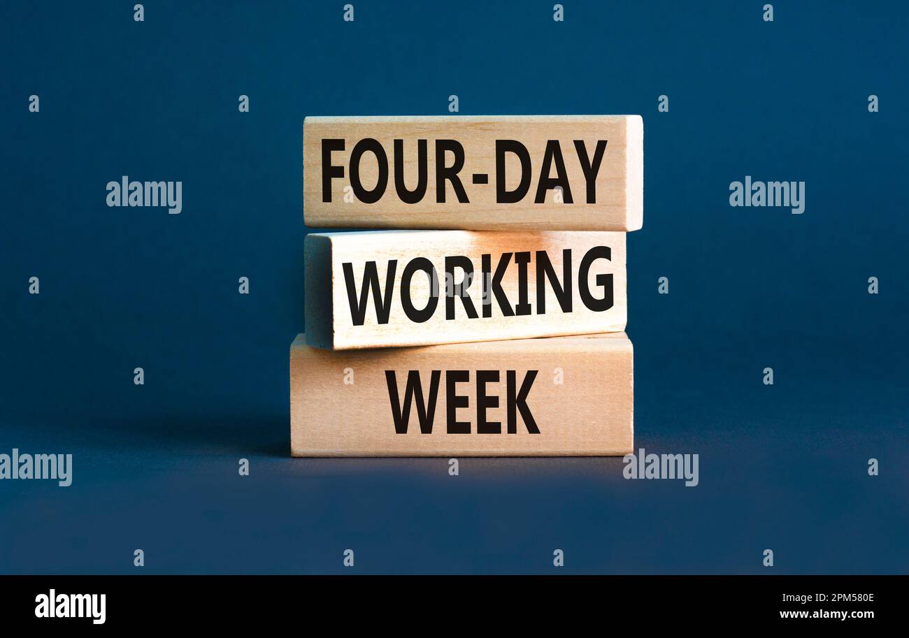 Four-day working week symbol. Concept words Four-day working week on wooden block on a beautiful ...