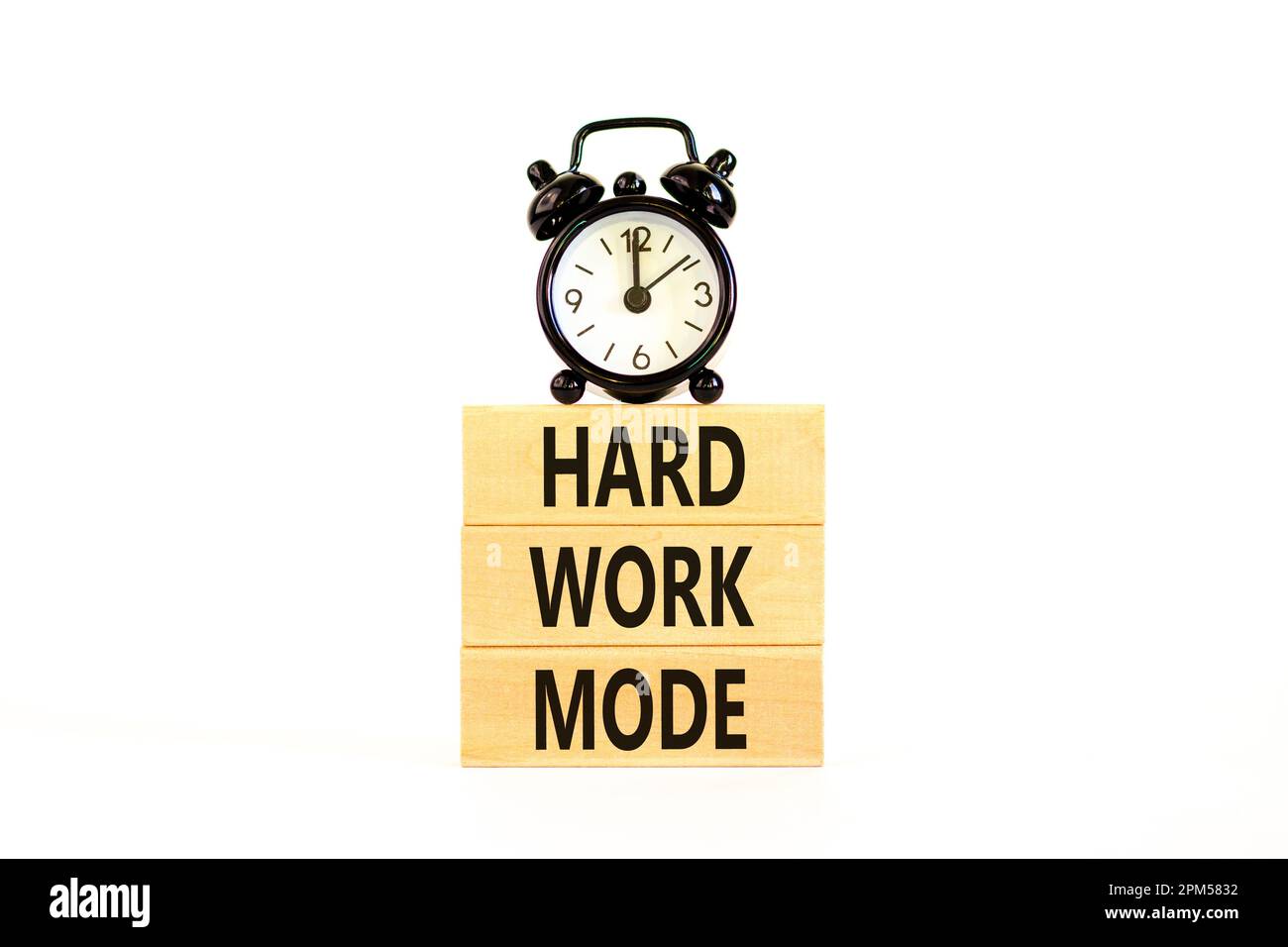 Hard work mode symbol. Concept words Hard work mode on wooden block on ...