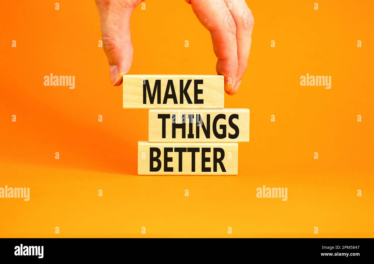 Make things better symbol. Concept words Make things better on wooden ...
