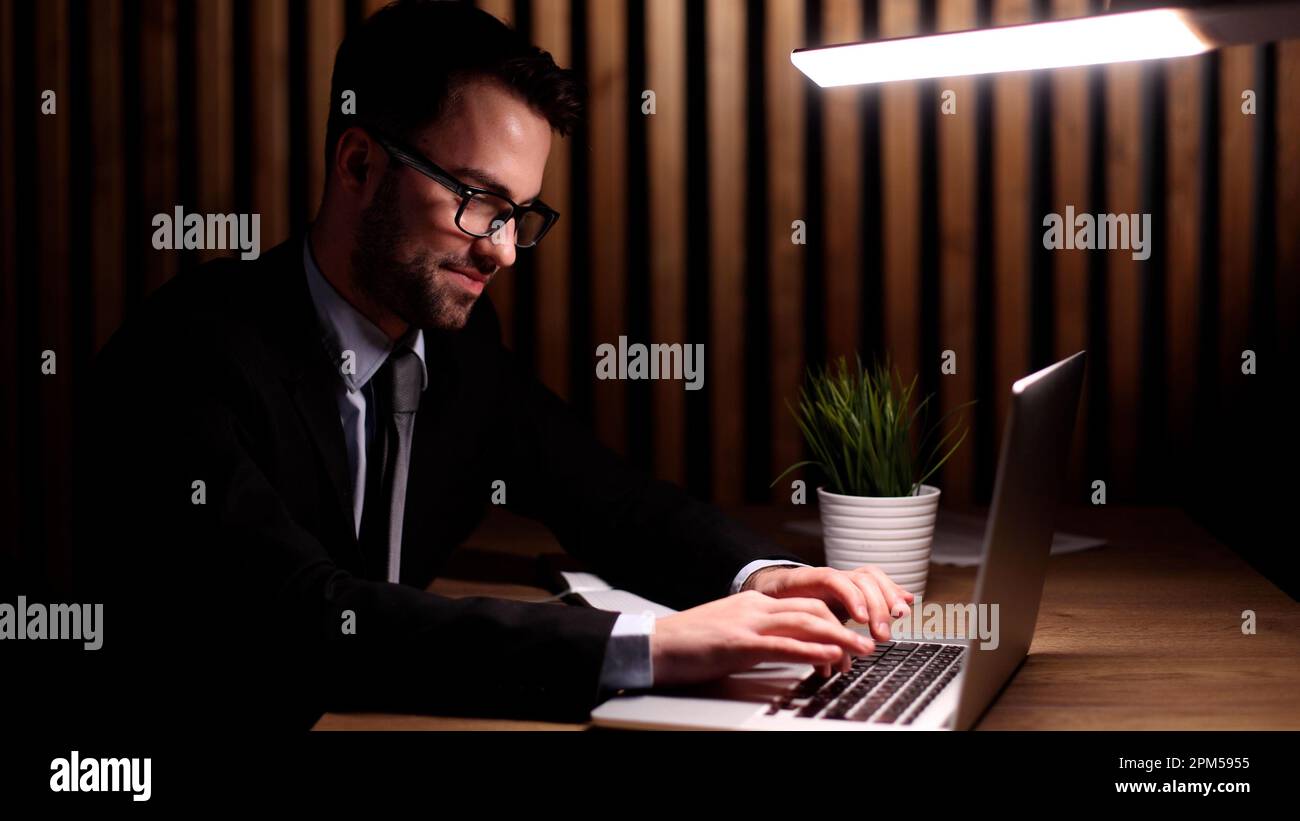 boss of the corporation looks into his laptop Stock Photo - Alamy