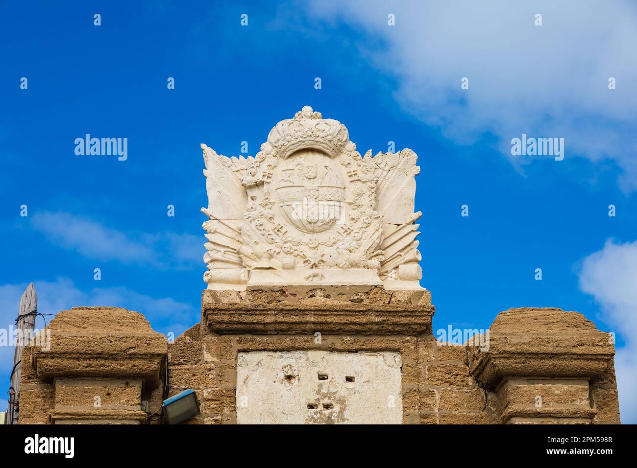 Crest above the entrance to Castillo de San Sebastian islands. Fort ...