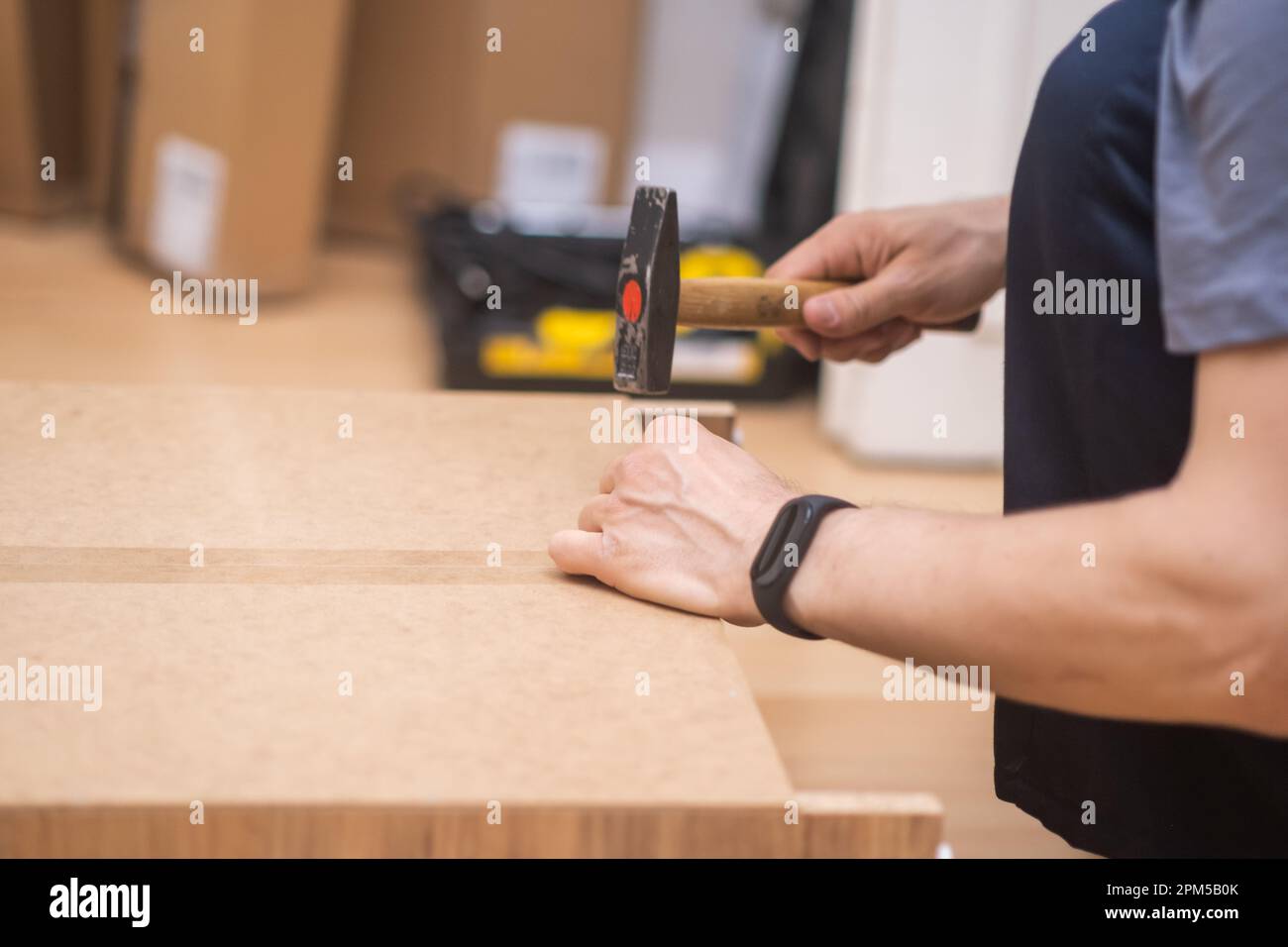 Close up carpenter repairman unscrewing hi-res stock photography and ...
