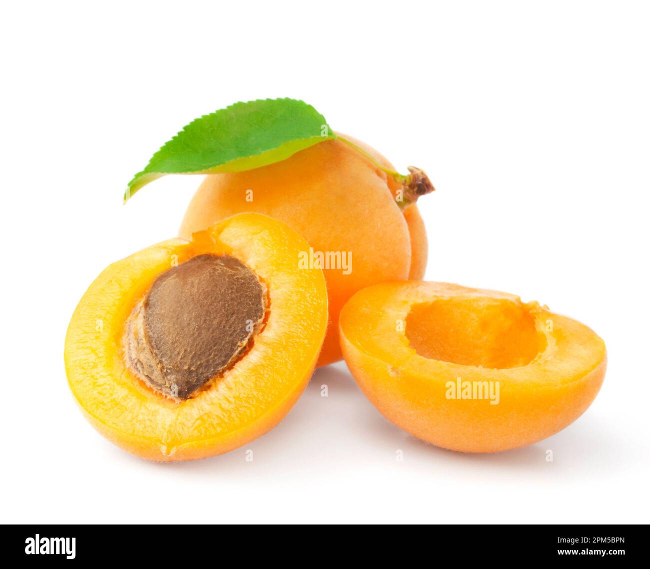Fresh apricot with leaf on white background Stock Photo - Alamy