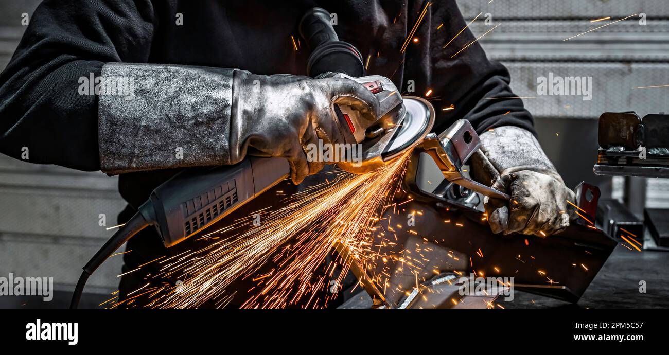 Worker grinding steel metal sheet hi-res stock photography and images ...