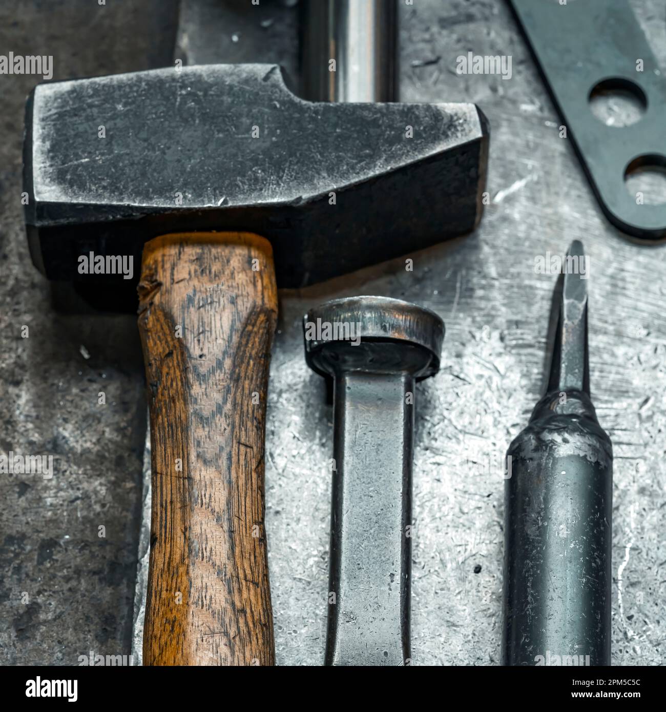 Vertical vie of hammer in an industrial warehouse, France Stock Photo ...