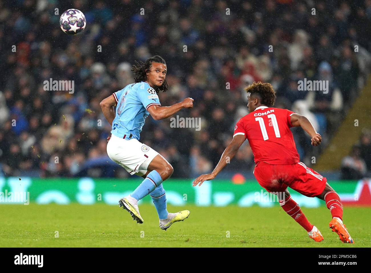 Manchester City's Nathan Ake (left) and Bayern Munich's Kingsley Coman ...