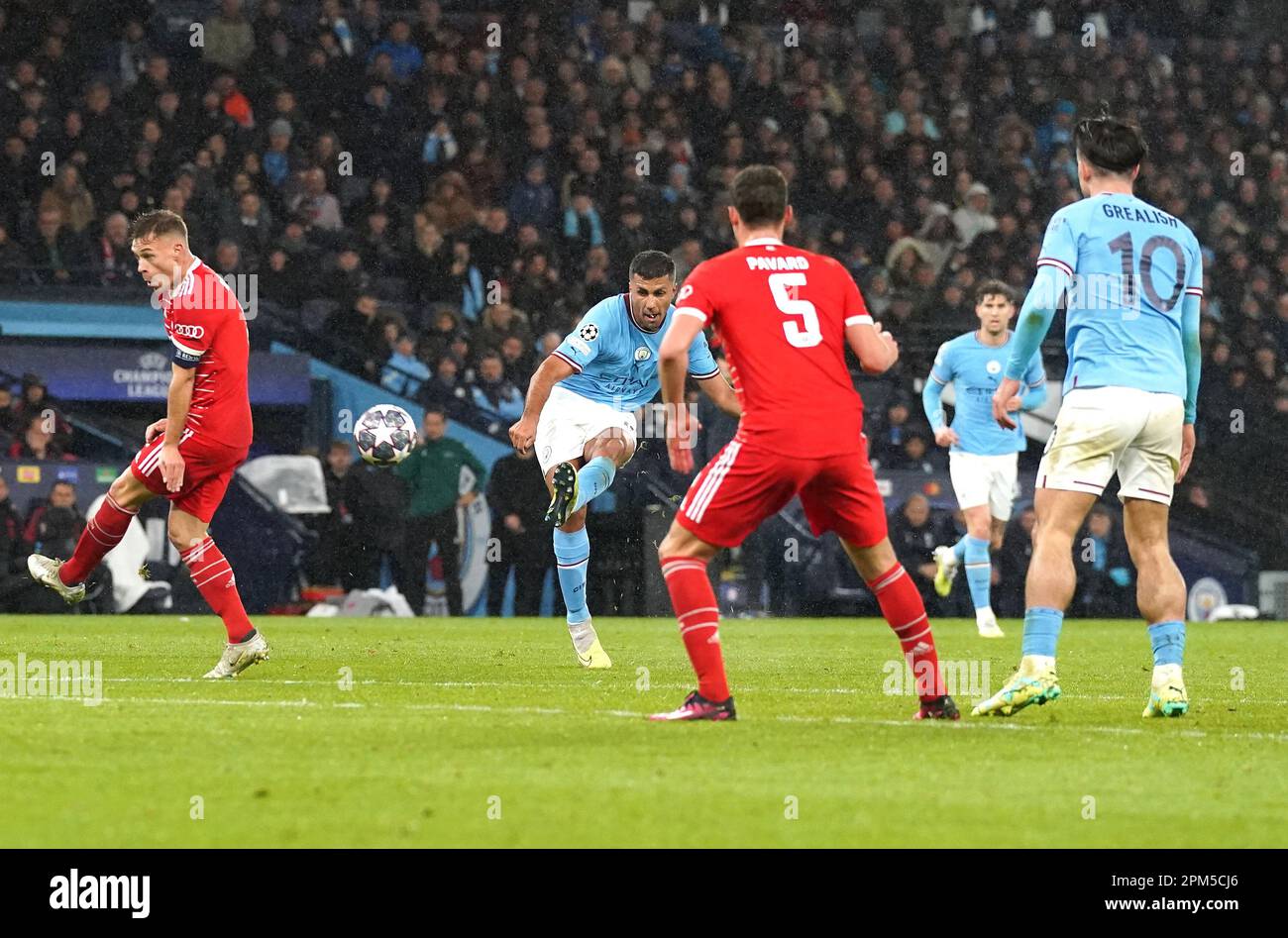 Manchester City's Rodri (centre let) scores their side's first goal of ...