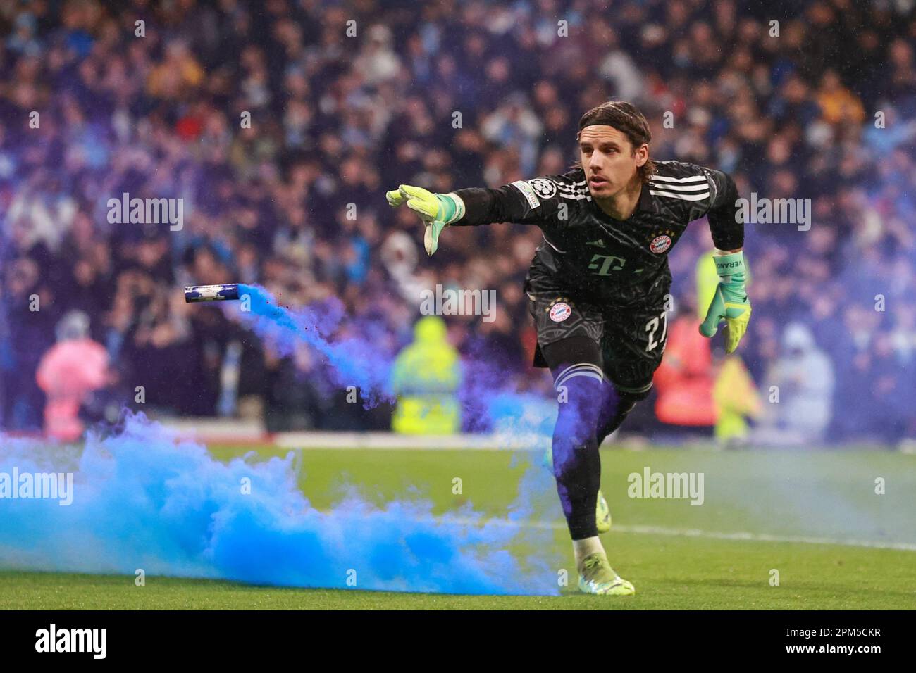 Yann Sommer #27 of Bayern Munich throws a flare off the pitch during the UEFA Champions League ...