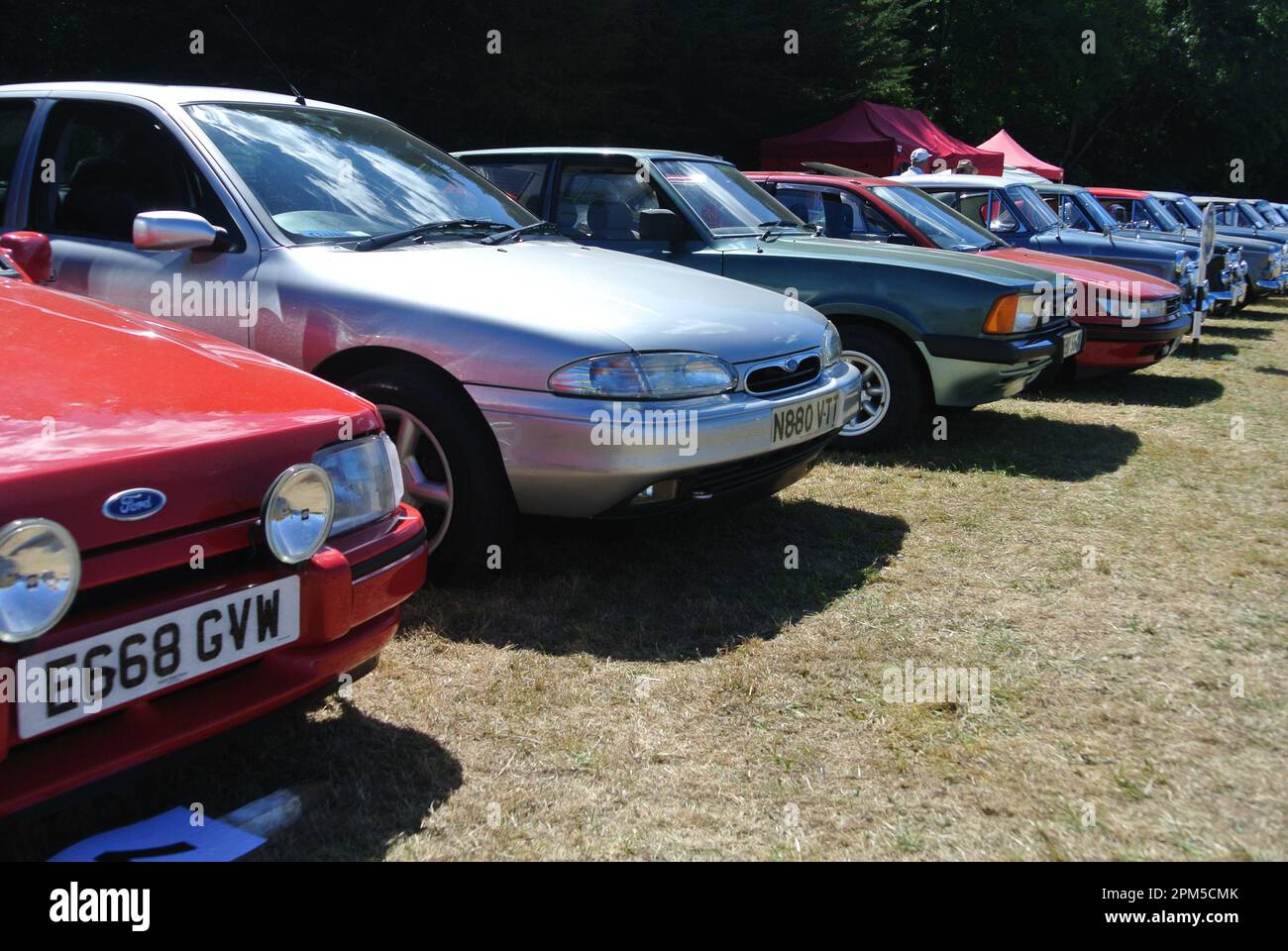 A line of modern classic cars parked on display at the 47th Historic ...