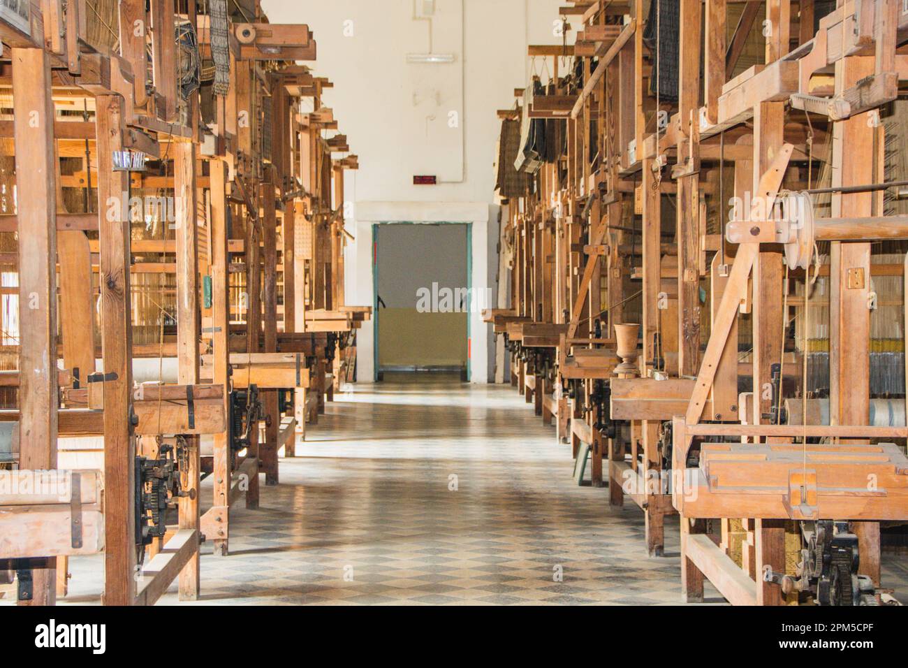 old looms in the textile laboratory of a school for blind kids in ...