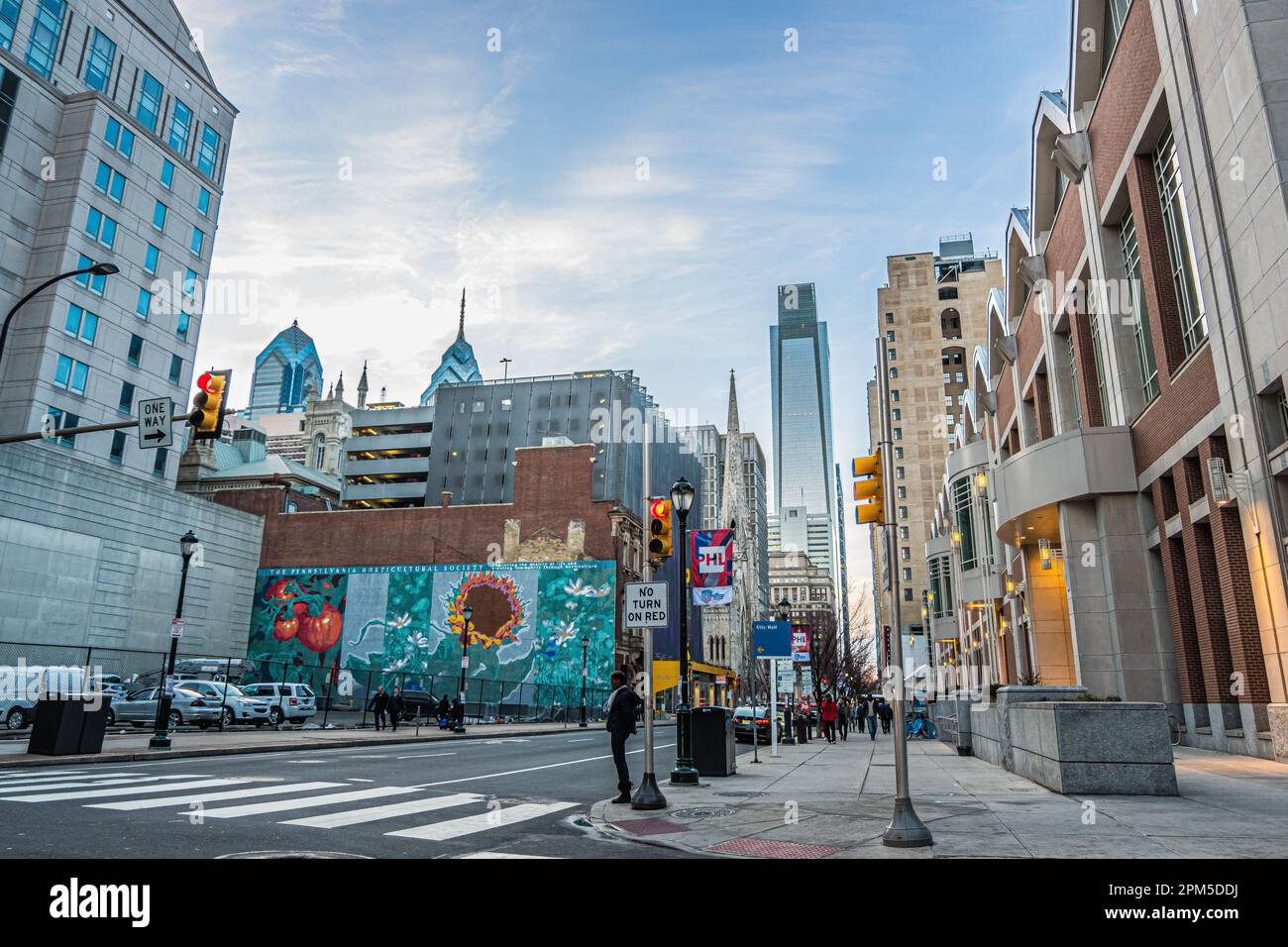 Busy downtown of Philadelphia USA. Tall skyscraper and busy streets ...