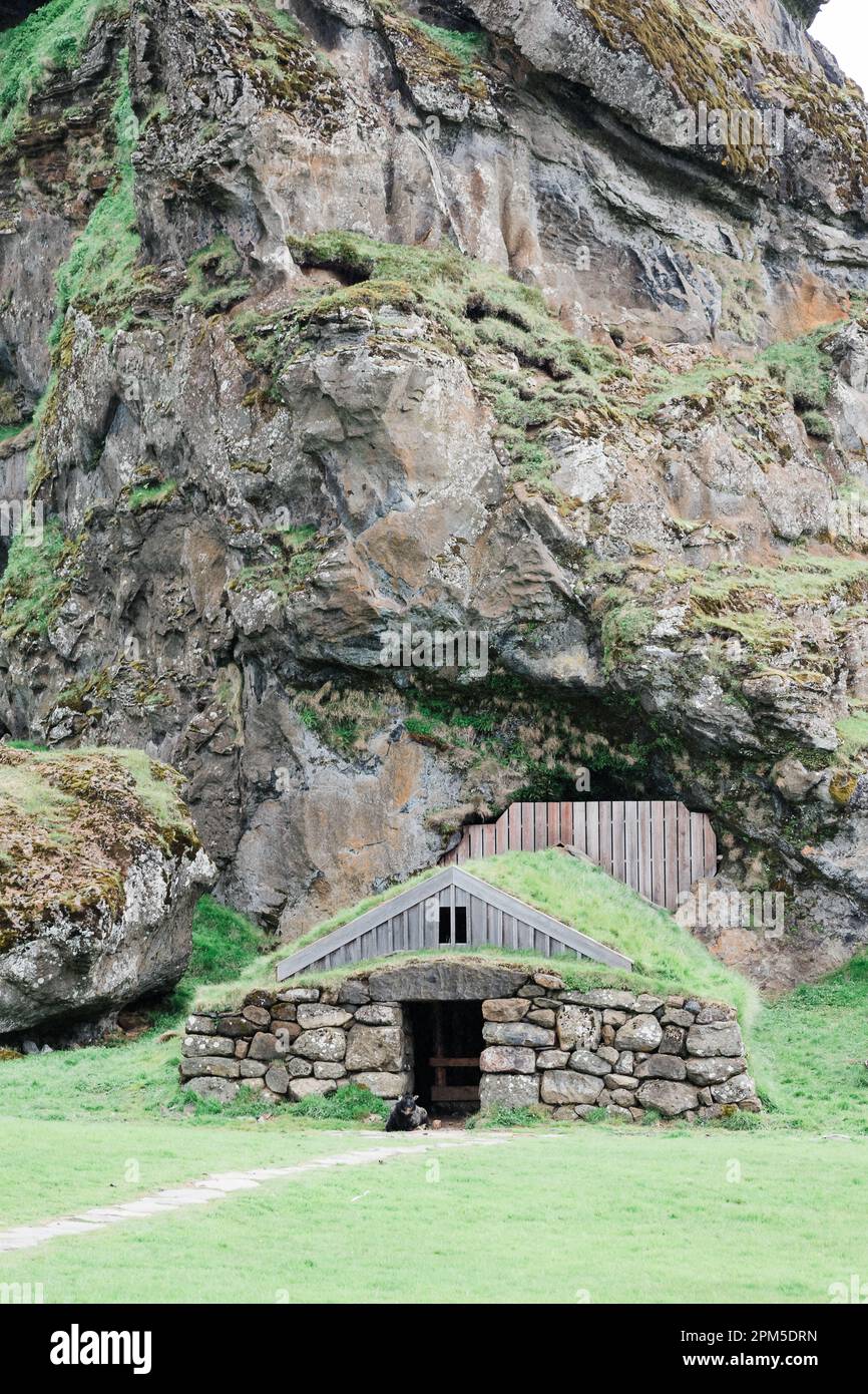 Iceland Turf House on Side of Mountain Stock Photo - Alamy