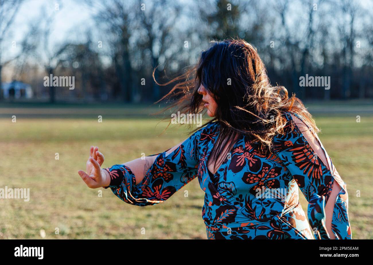 Woman outside wind hi-res stock photography and images - Alamy