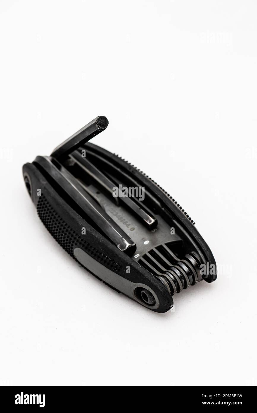 Grey hex key tool on white background Stock Photo - Alamy
