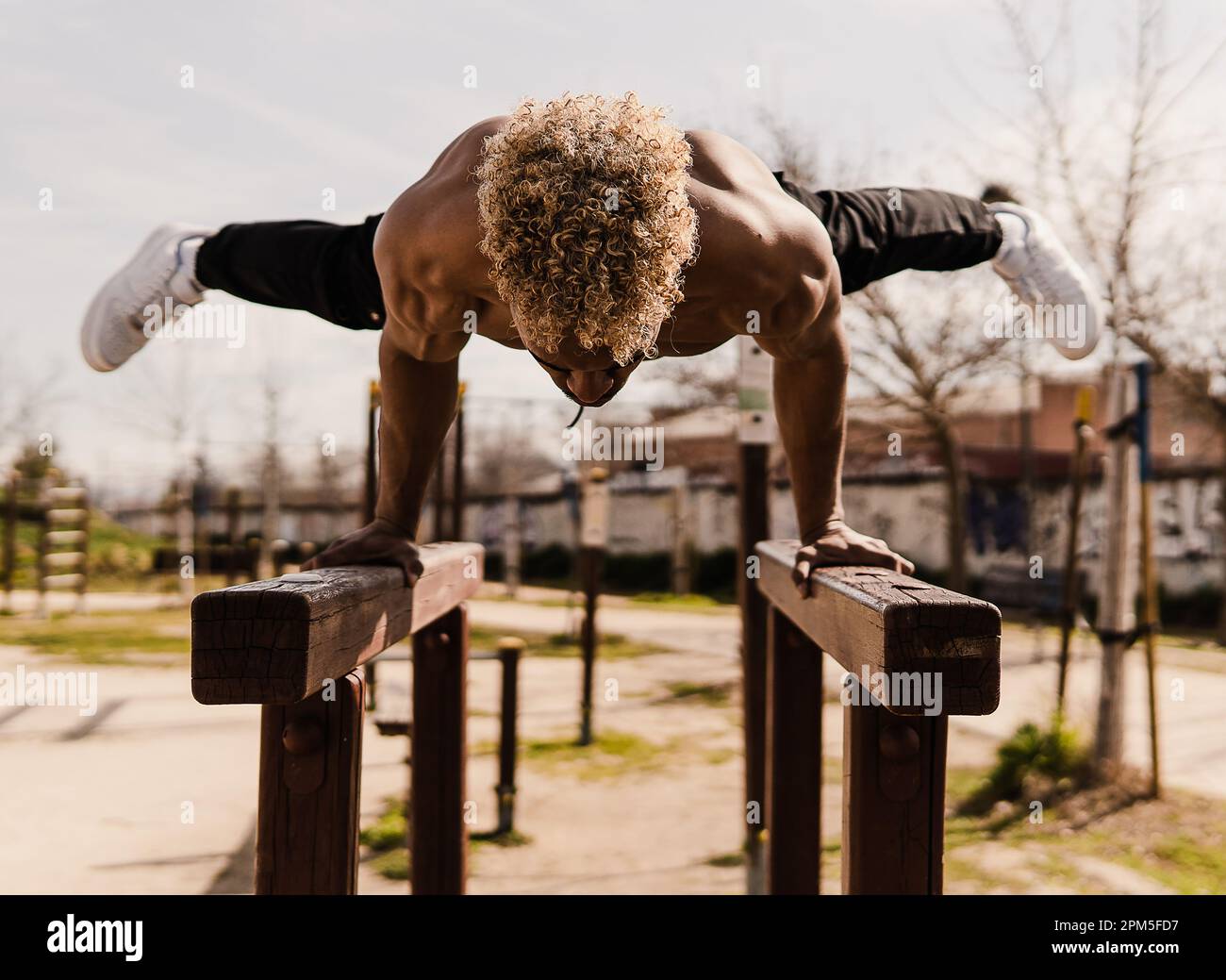 Stock photo of black man doing calisthenics in a park Stock Photo - Alamy Stock photo of black man doing calisthenics in a park Stock Photo - Alamy