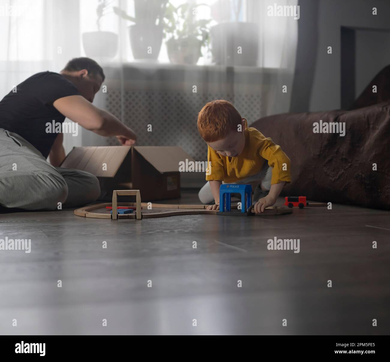 Dad toddler son building toy hi-res stock photography and images - Alamy