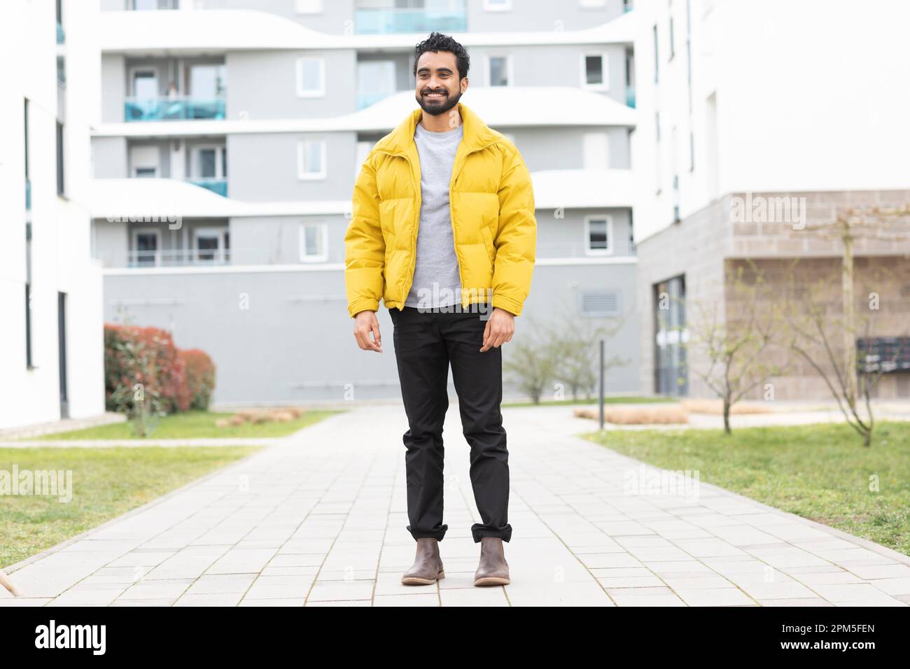 portrait of a young man with short hair standing outside Stock Photo ...
