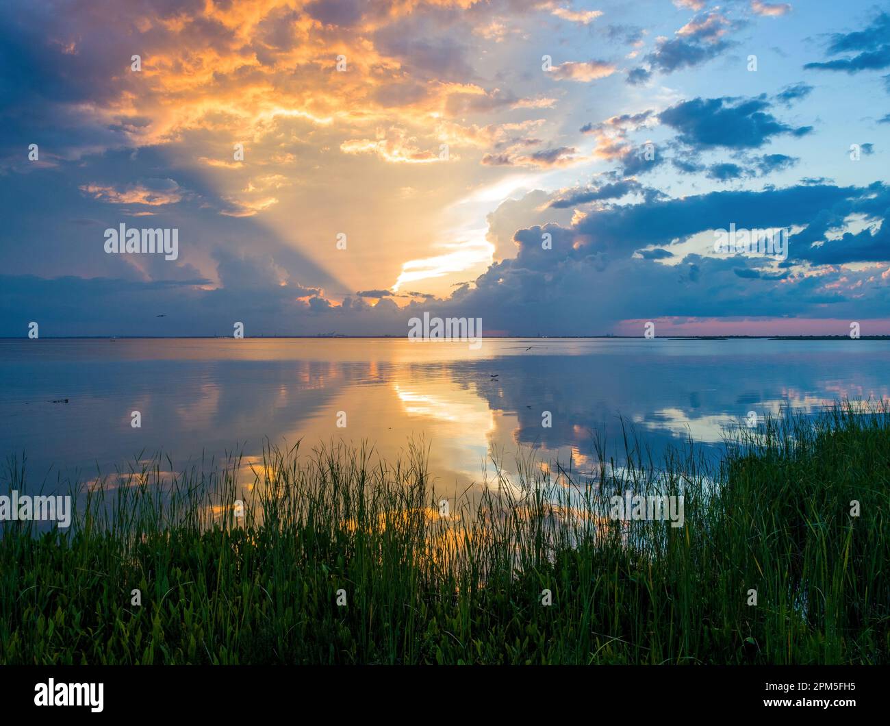 The Eastern Shore of Mobile Bay at sunset Stock Photo - Alamy