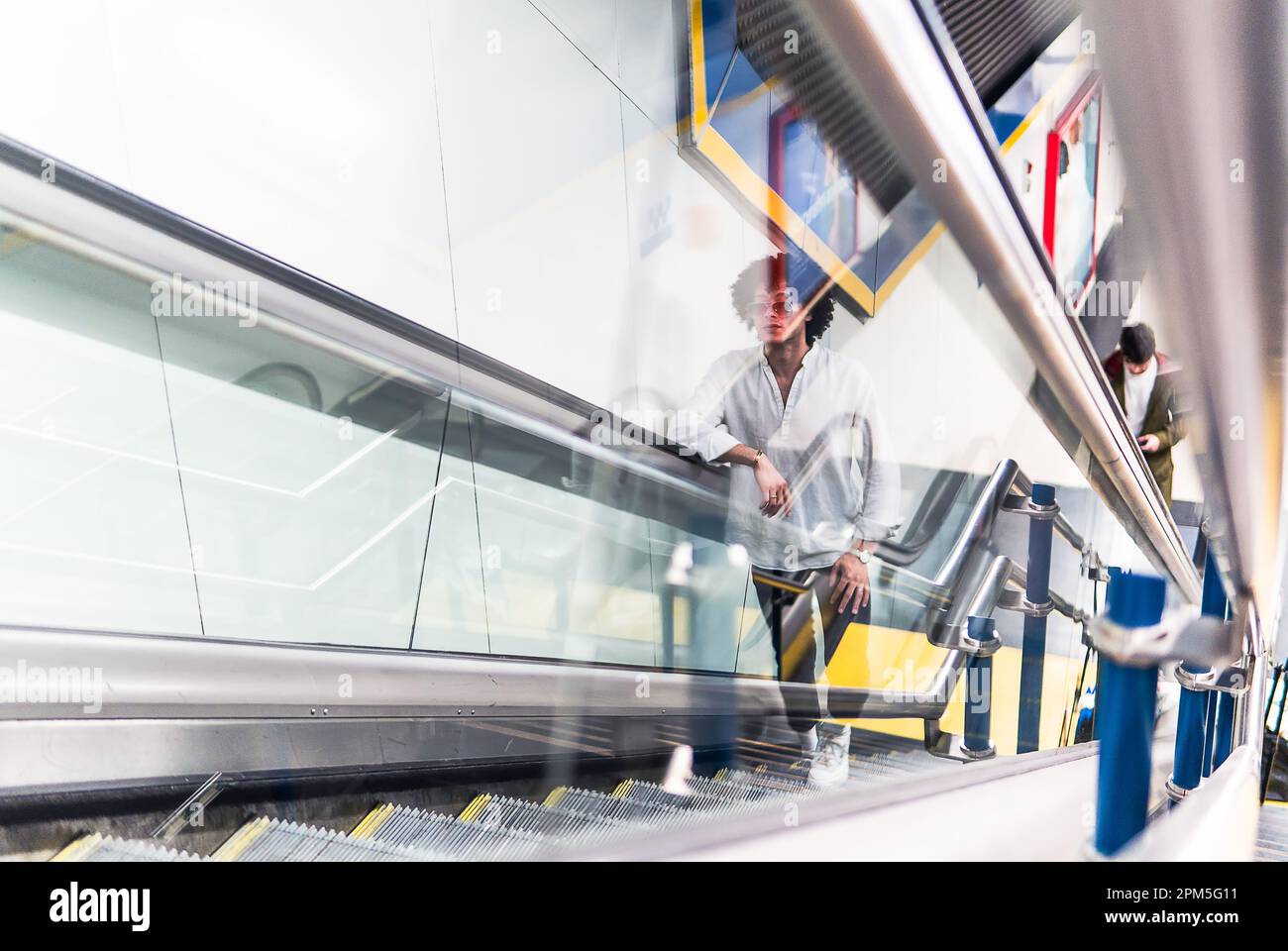 stock photo of latin businessman riding subway to work Stock Photo - Alamy