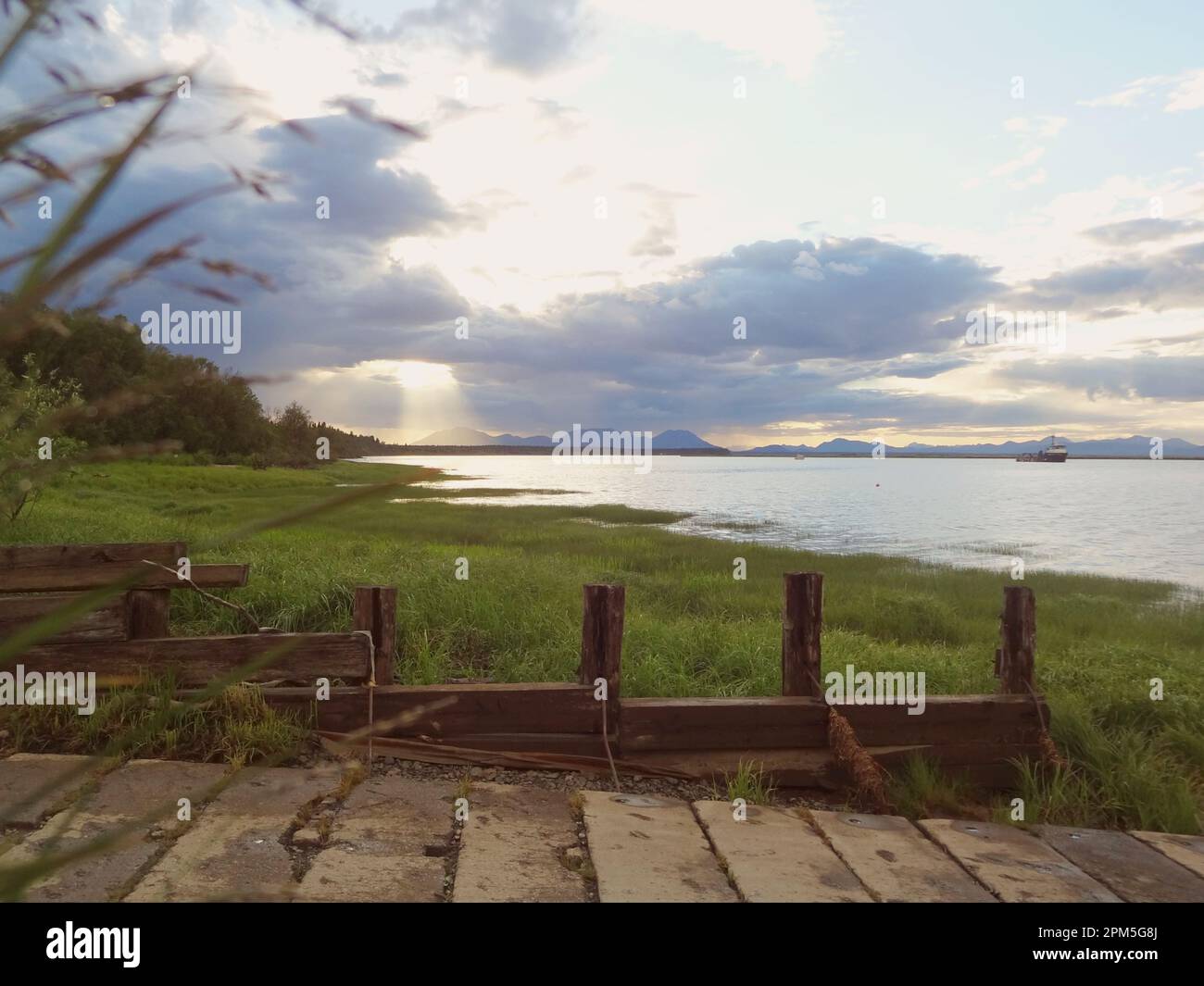 Sun Beams shining through Clouds over River in Alaska Stock Photo - Alamy