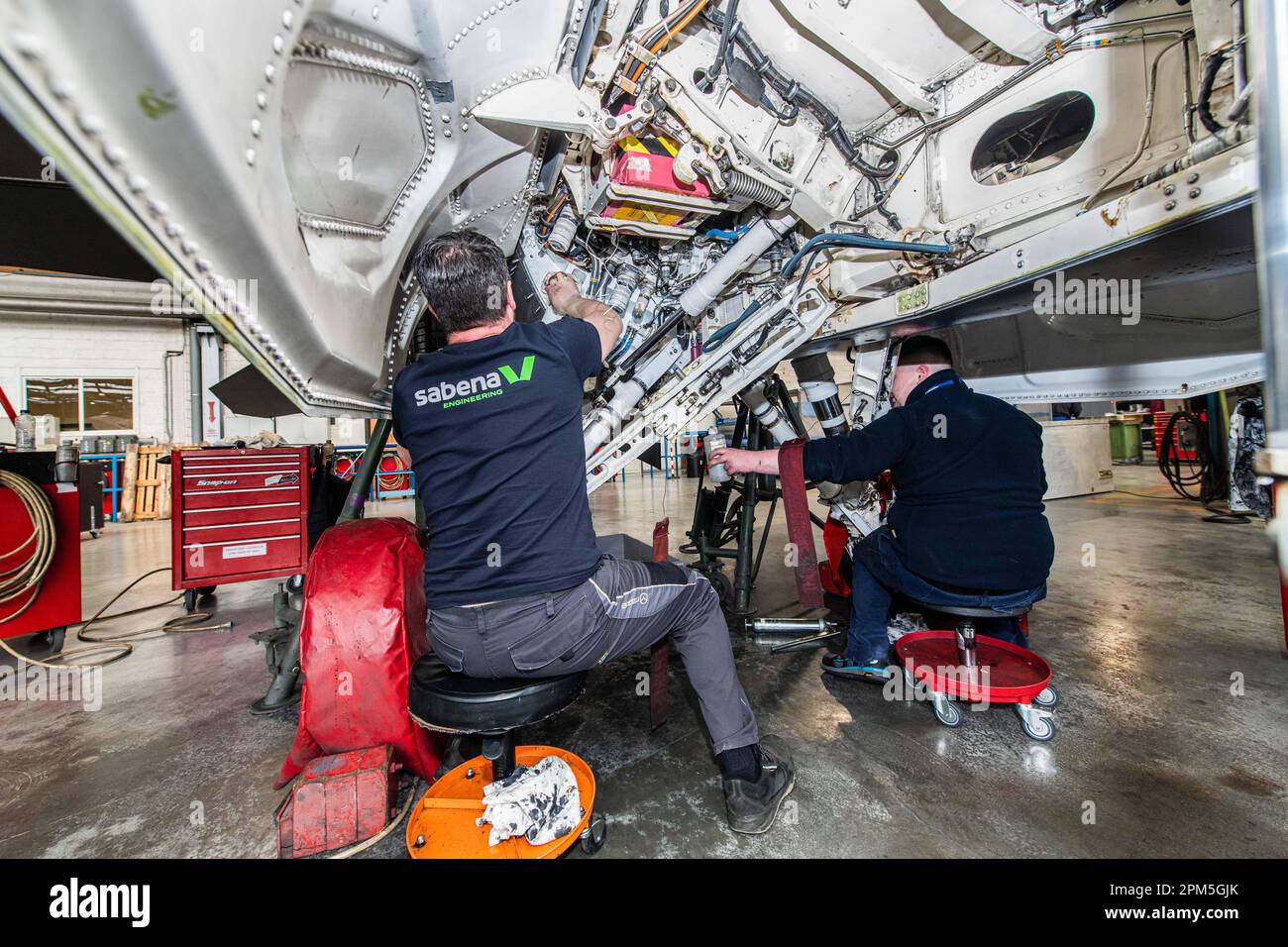 Illustration picture shows a technician working on an F16 fighter jet ...