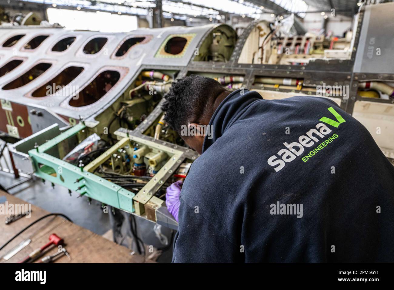 Illustration picture shows a technician working on an F16 fighter jet during a visit to Orizio ...