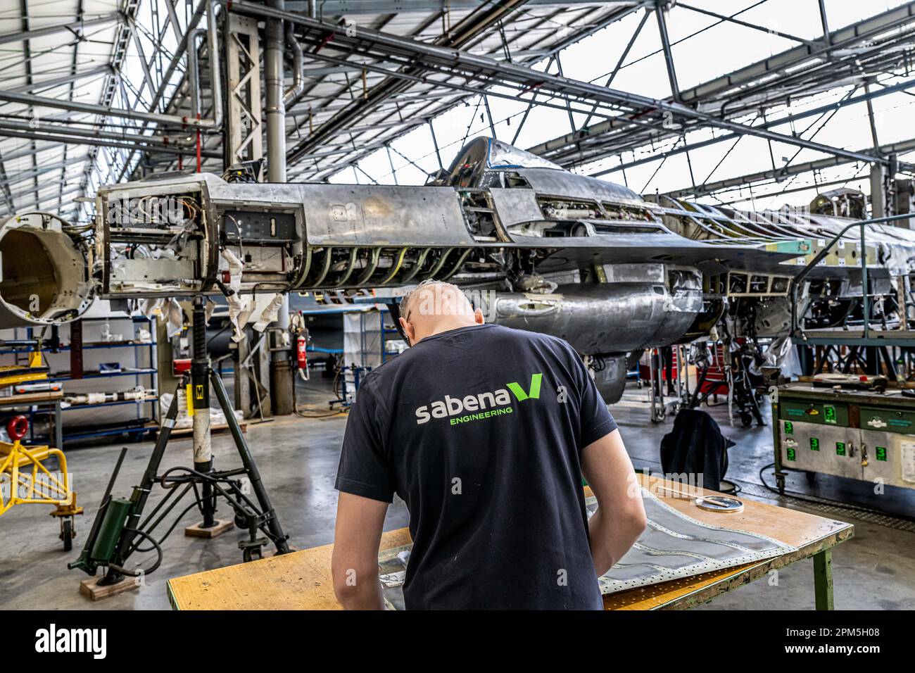 Illustration picture shows a technician working on an F16 fighter jet during a visit to Orizio ...
