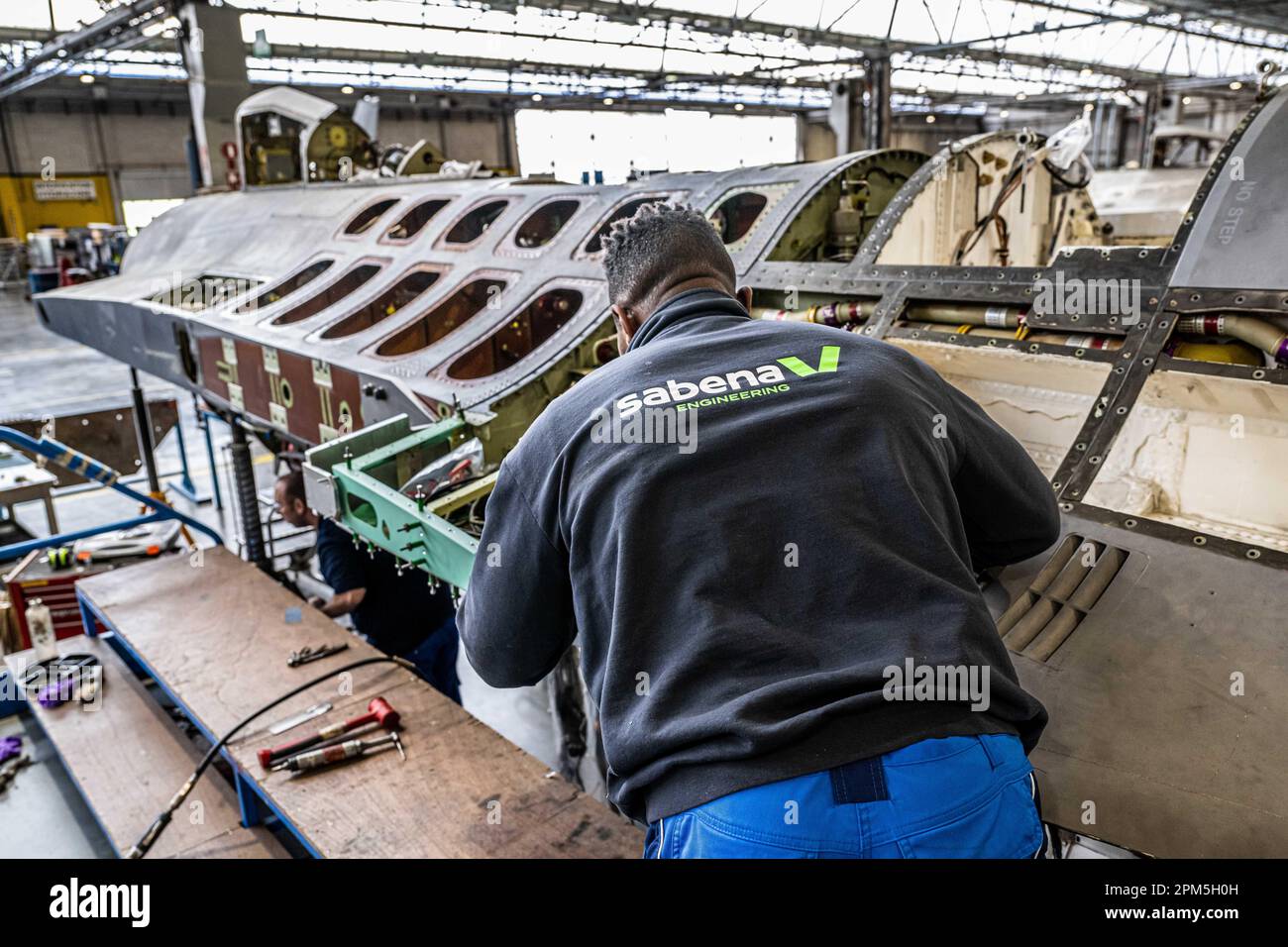 Illustration picture shows a technician working on an F16 fighter jet during a visit to Orizio ...