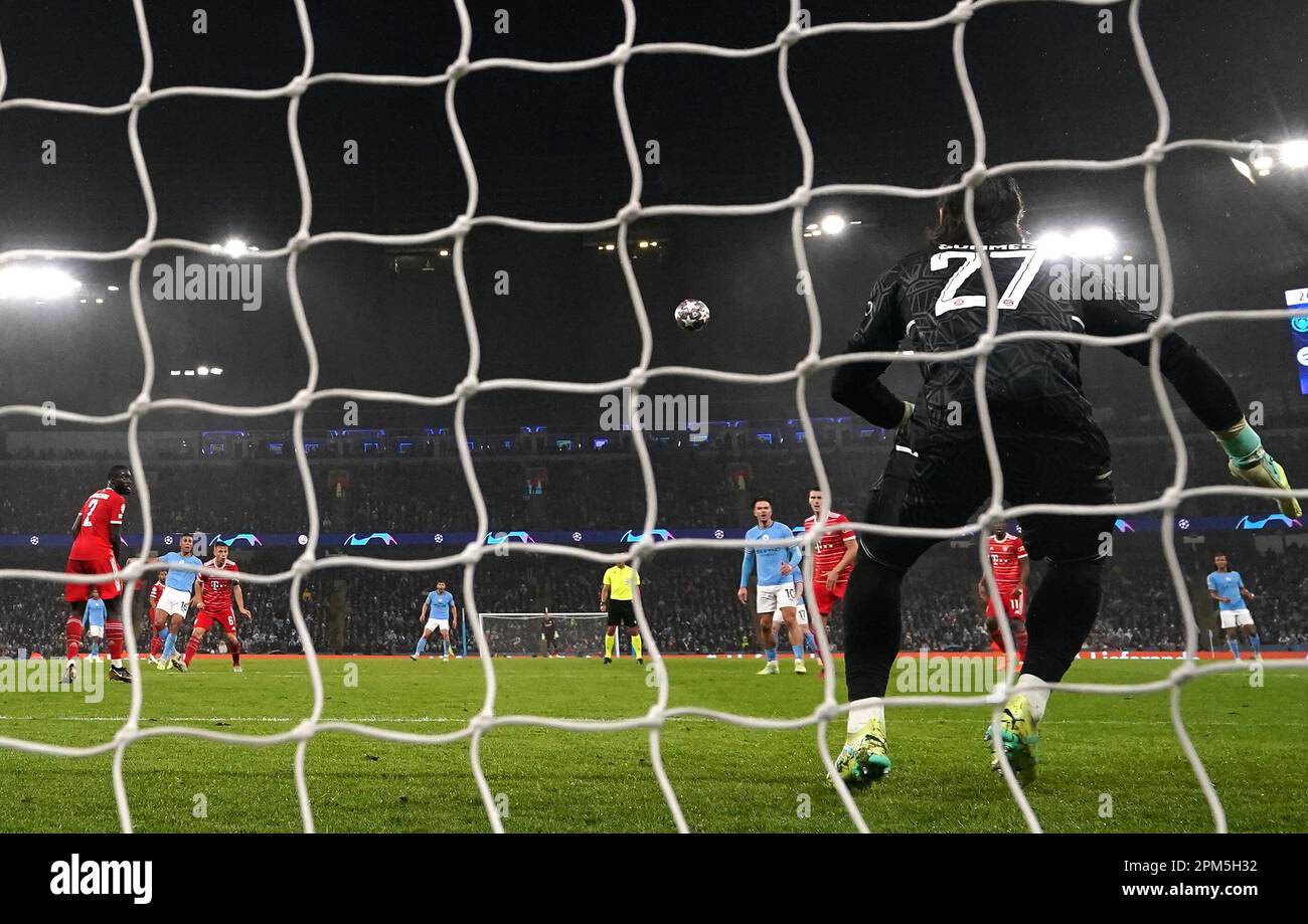 Manchester City's Rodri (second left) scores their side's first goal of ...