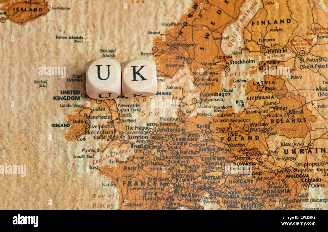 the national union jack flag of great britian ,blue and red on world ...