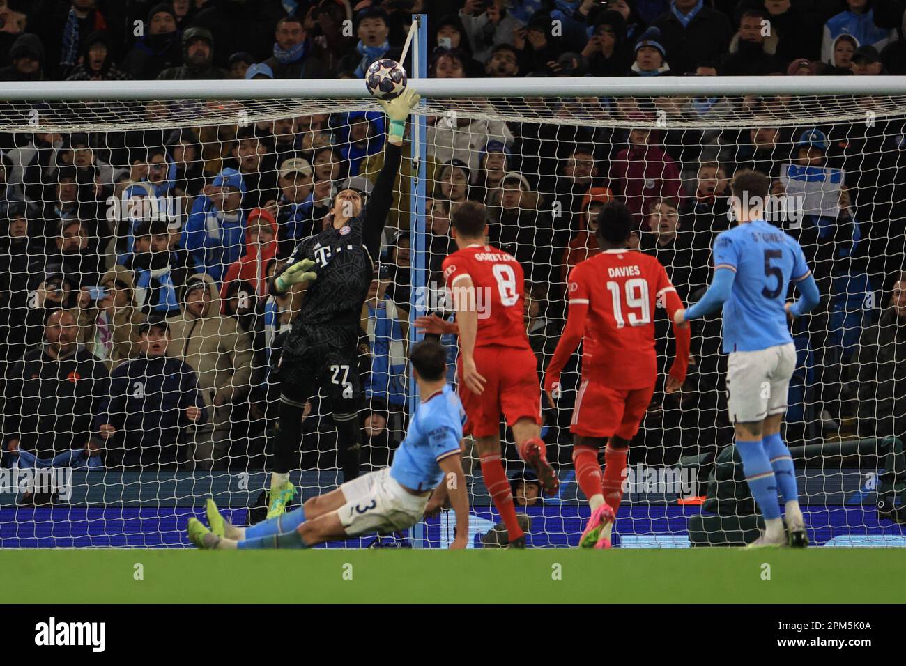 Yann Sommer #27 of Bayern Munich saves a shot from Rúben Dias #3 of Manchester City during the ...