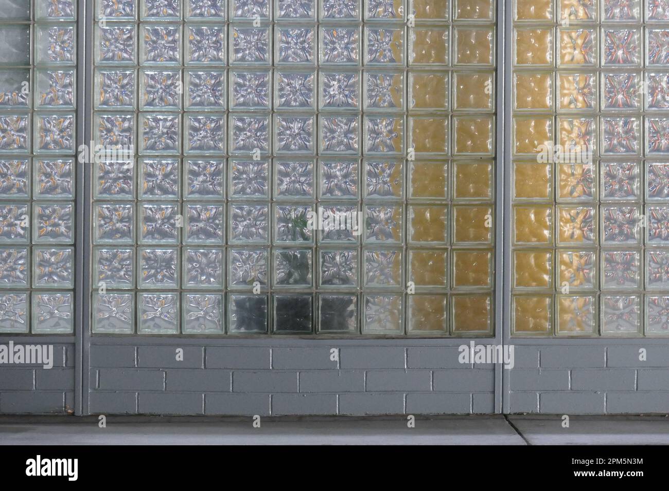 Closeup of a wall constructed with semi-transparent glass blocks Stock ...