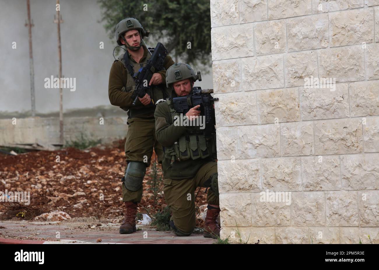 Nablus, Palestinian Territories. 11th Apr, 2023. Israeli soldiers take ...