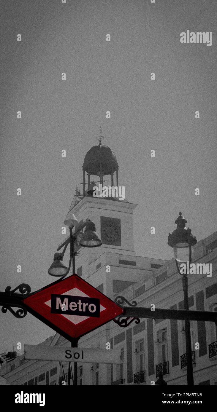 old style metro panel from madrid with the old bulding Stock Photo - Alamy