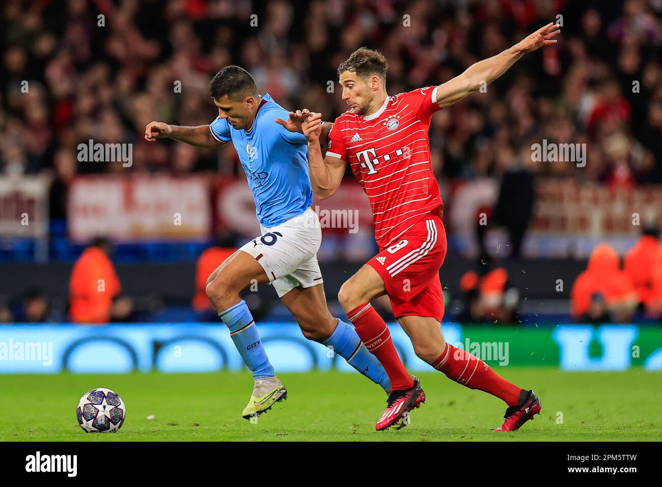 Rodri #16 of Manchester City holds off Leon Goretzka #8 of Bayern ...