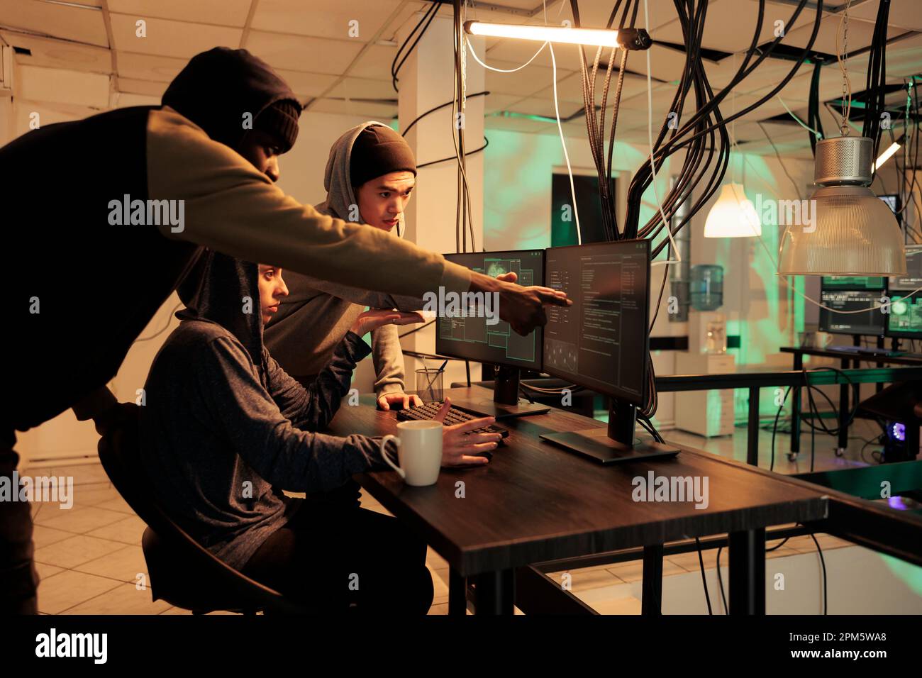 Diverse group of hackers working together to crack server, planting ...