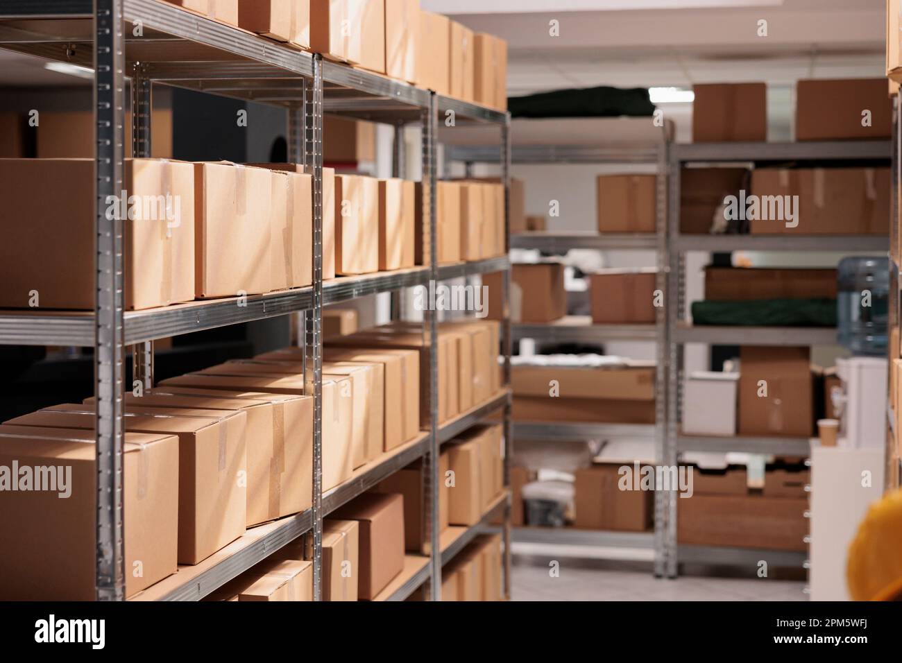 Goods packages lying on storehouse racks, waiting for transportration ...