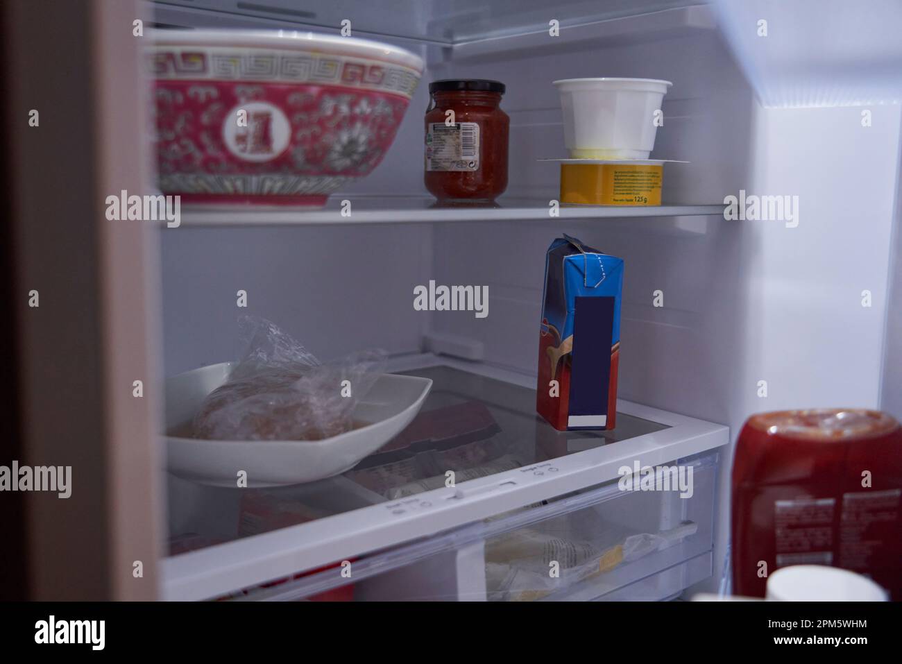Empty red open fridge hi-res stock photography and images - Alamy