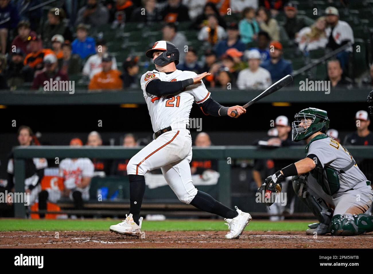 Baltimore Orioles' Austin Hays (21) hits a double against Oakland ...