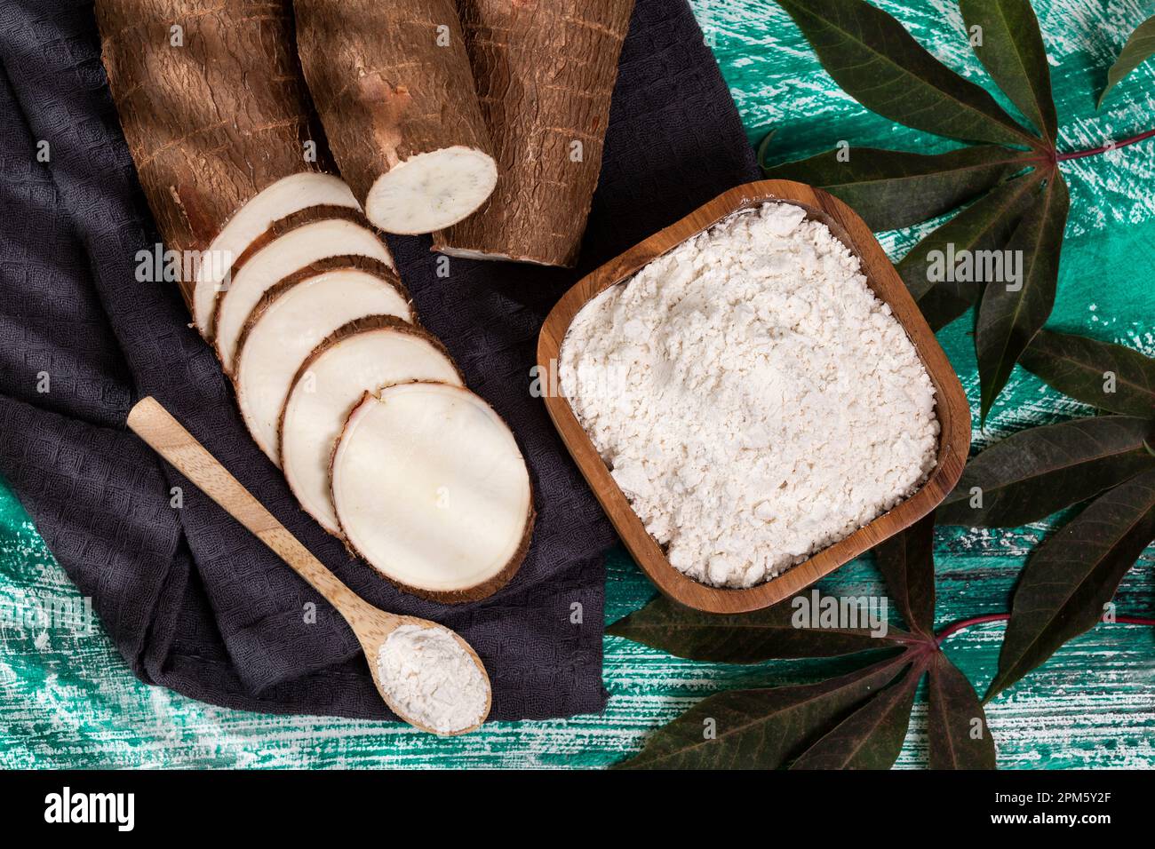 Raw Cassava Root And Starch - Manioc Esculenta; On Wooden Background ...