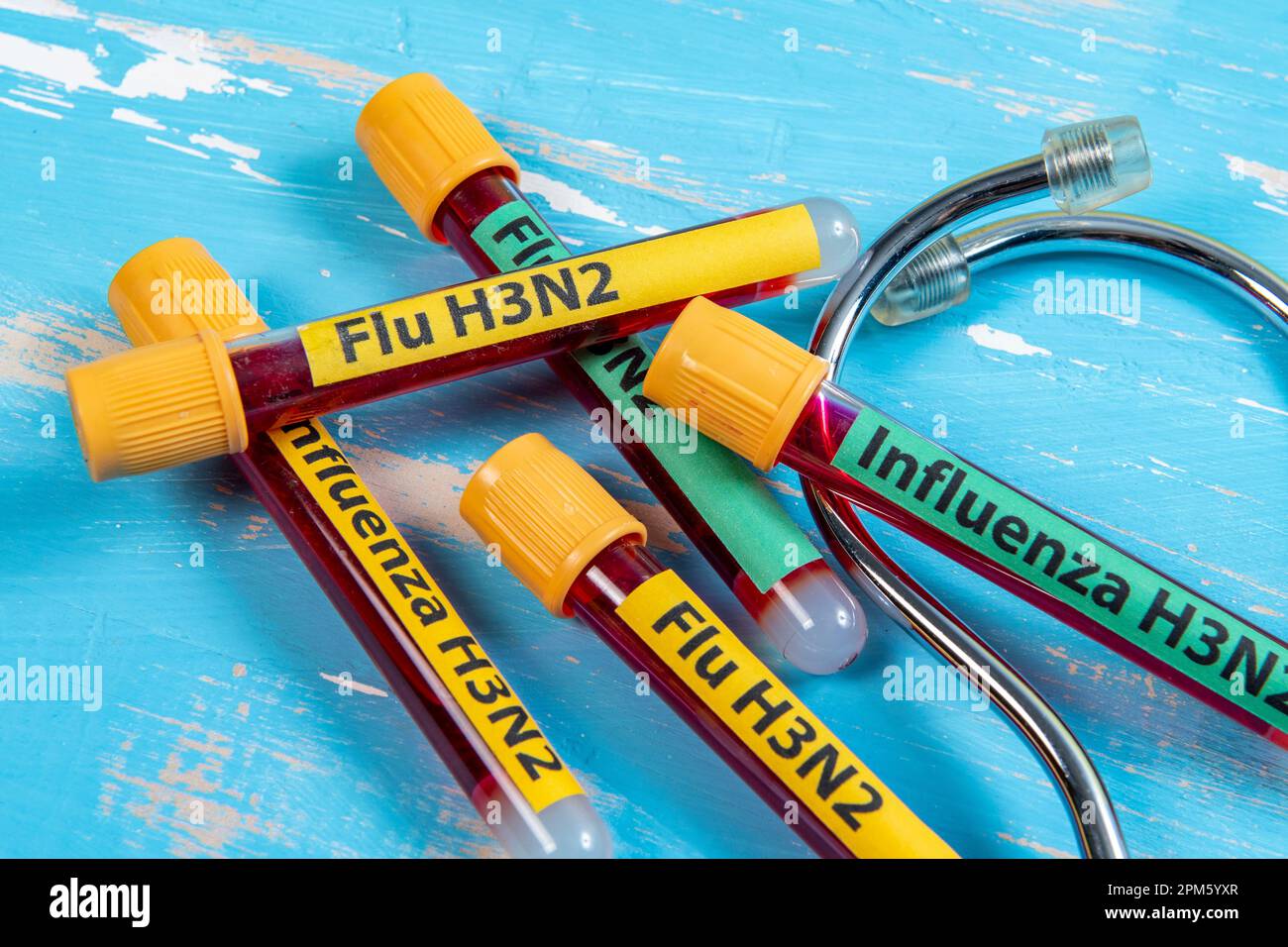 vacuum vials for blood collection written FLU H3N2 in reference to the ...