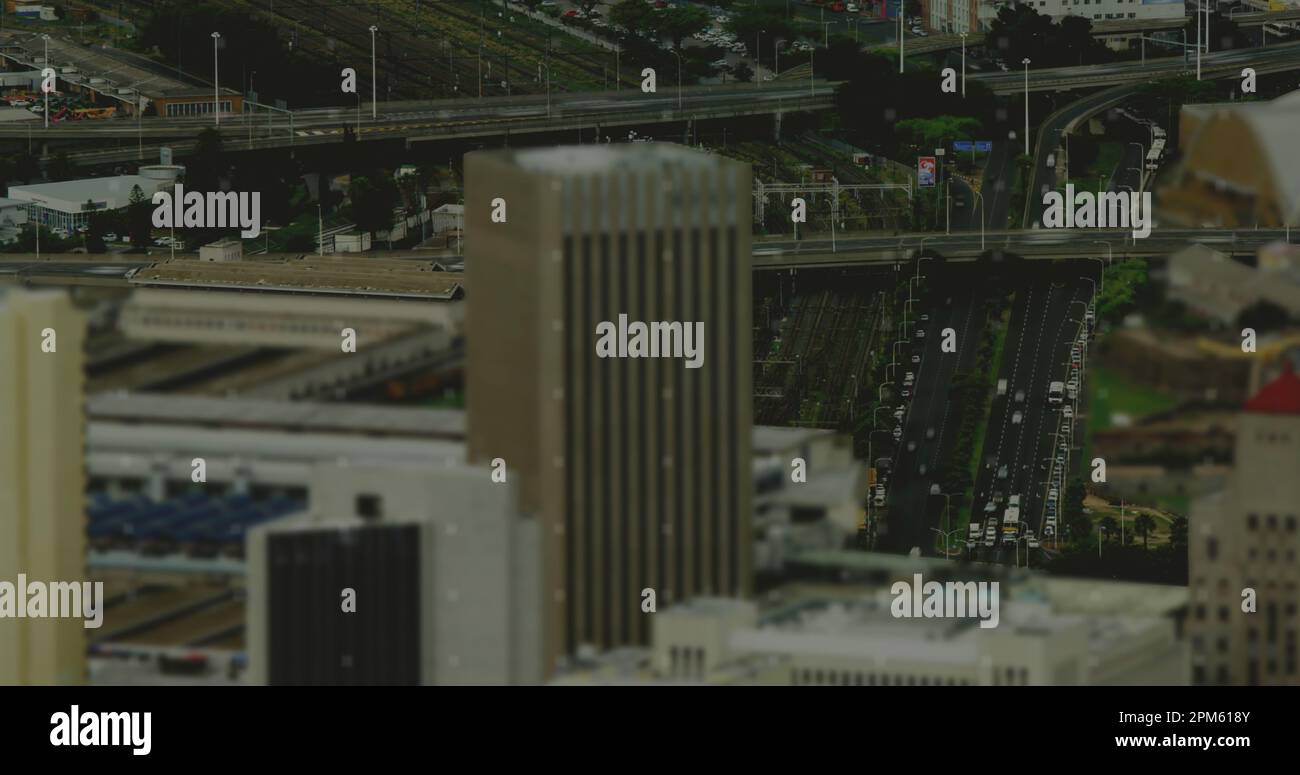 Composition of buildings over cars on street Stock Photo - Alamy