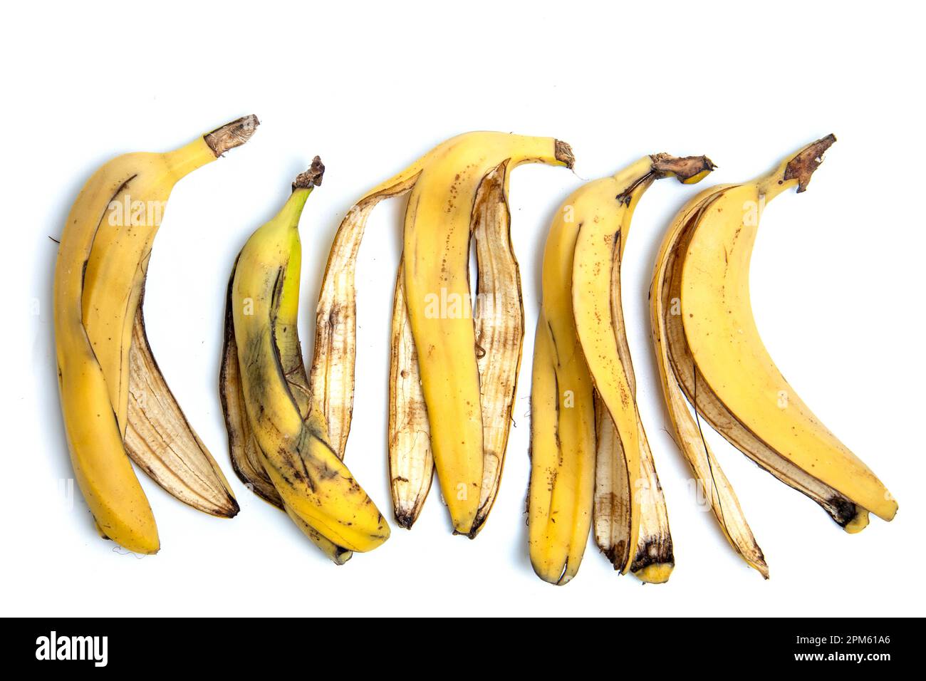Banana peels on a white background Stock Photo - Alamy